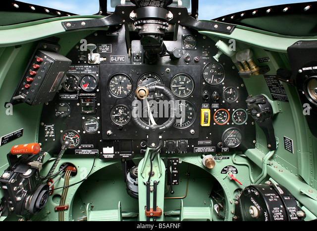 Cockpit of a Spitfire MkV showing the instrument panel and controls ...